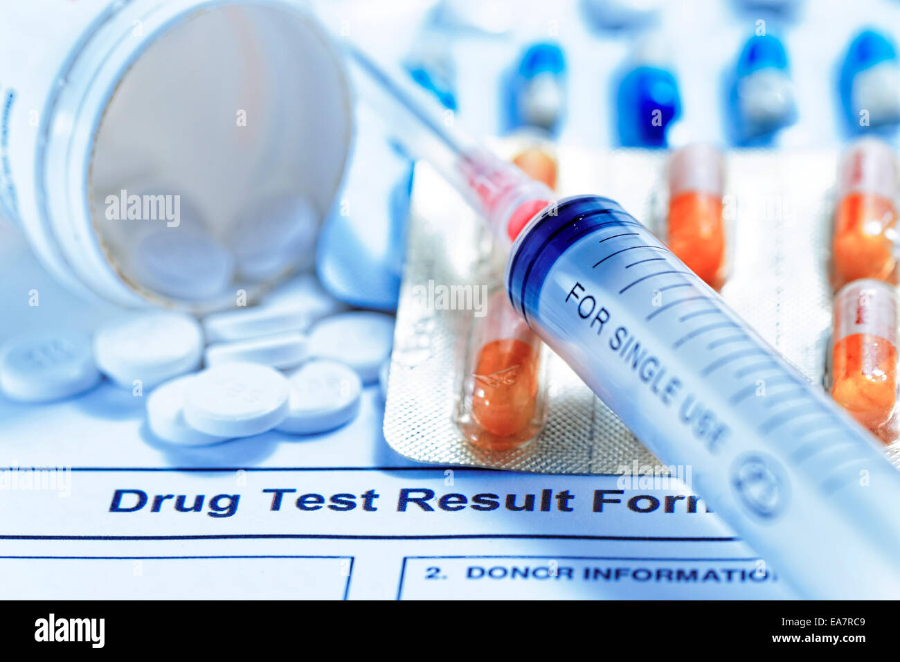 Syringe with glass vials and medications pills drug test report Stock ...