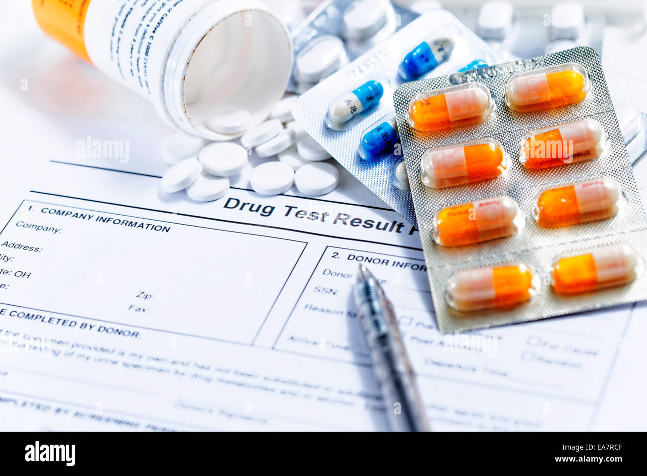 Syringe with glass vials and medications pills drug test report Stock ...