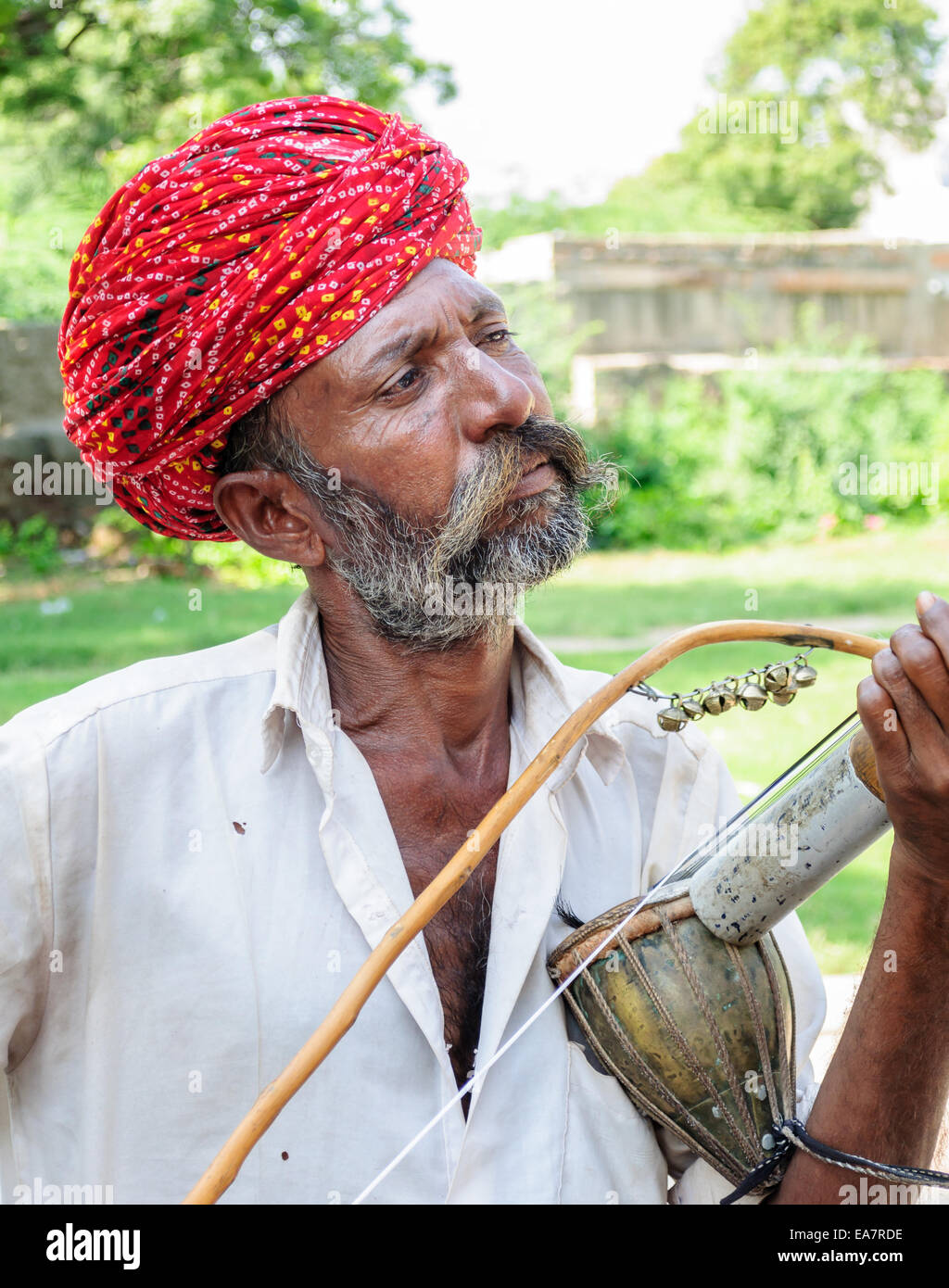 Old folk musician of Rajasthan playing Ravanhatha at Mador garden ...