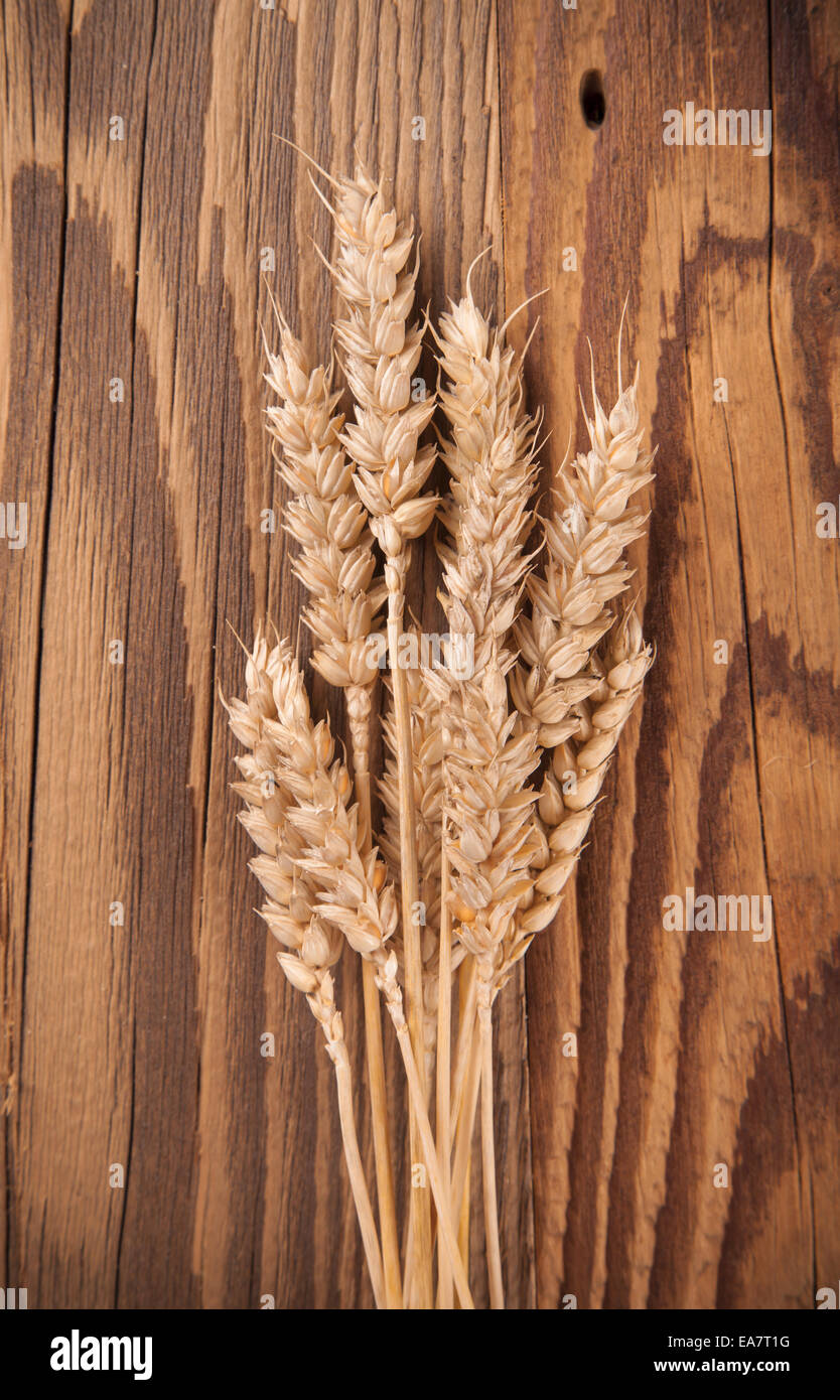wheat on the wood background Stock Photo - Alamy