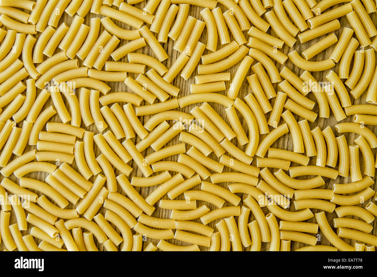 Italian dry pasta covers all over the wooden table Stock Photo - Alamy