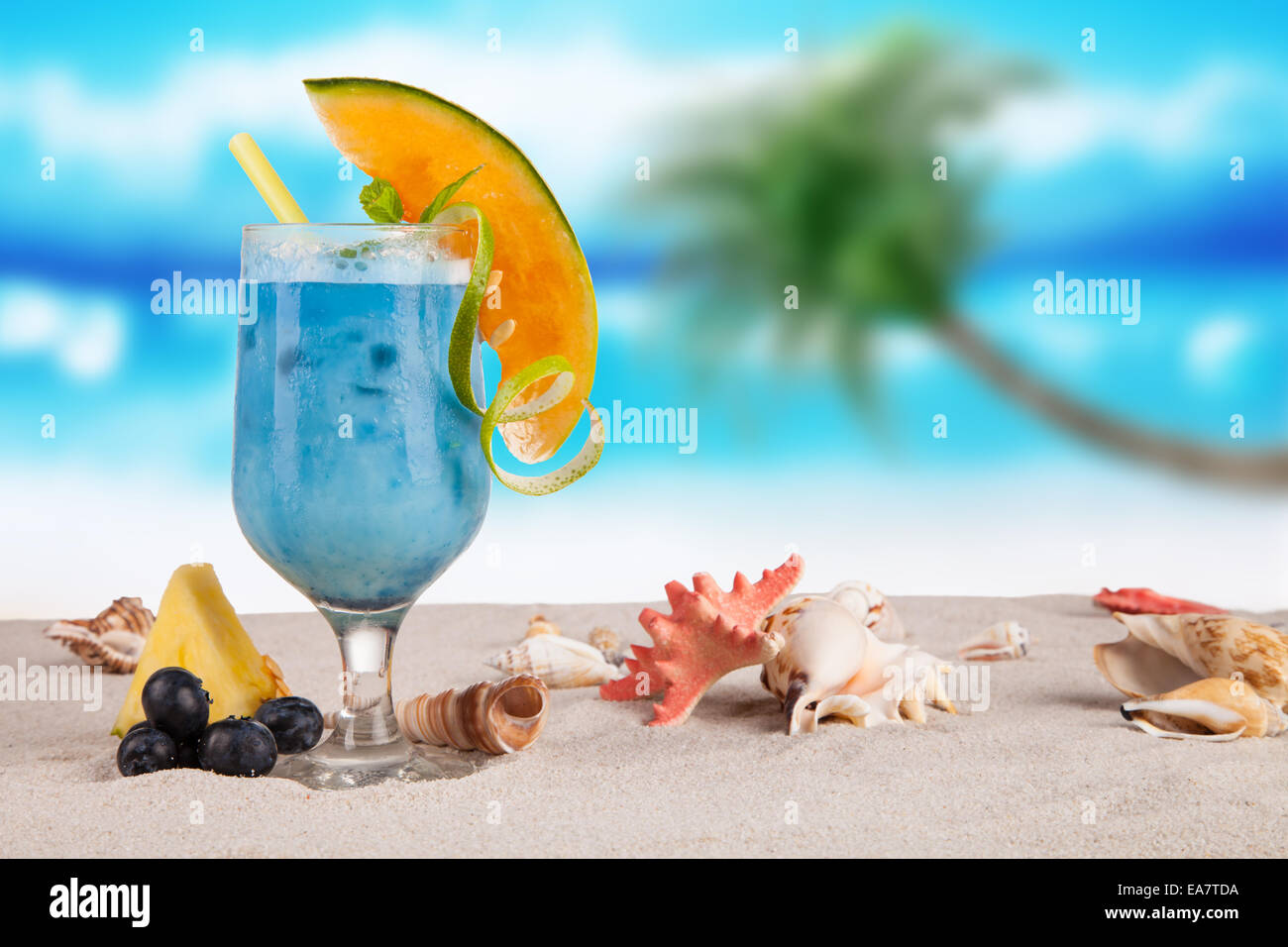 Summer drink on beach with sea shells Stock Photo - Alamy