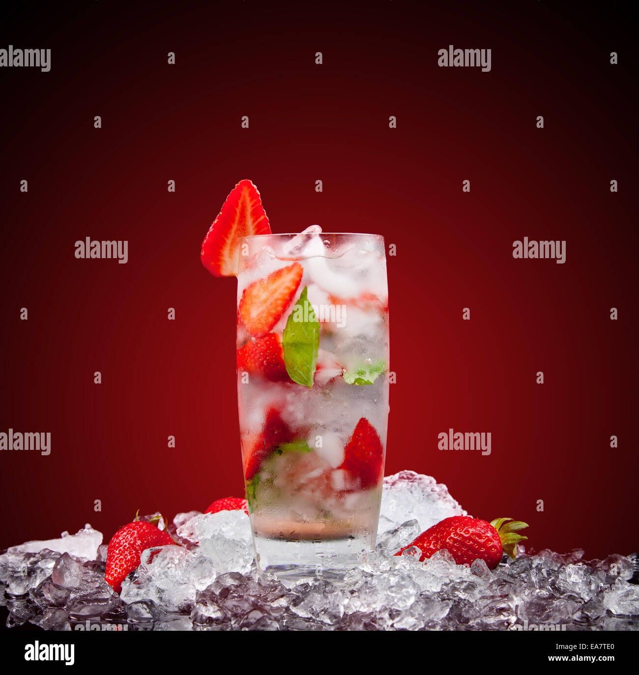 Fruit cocktail with dark background Stock Photo - Alamy
