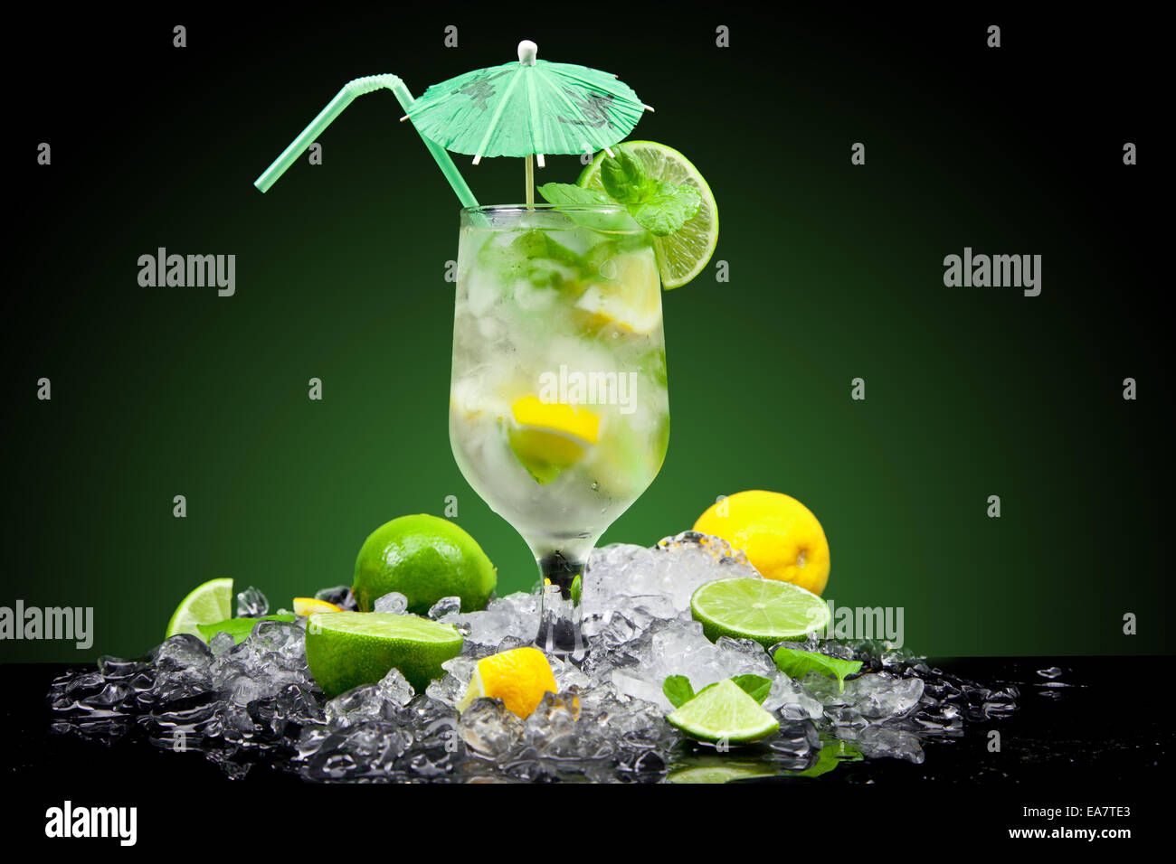 Fruit cocktail with dark background Stock Photo - Alamy
