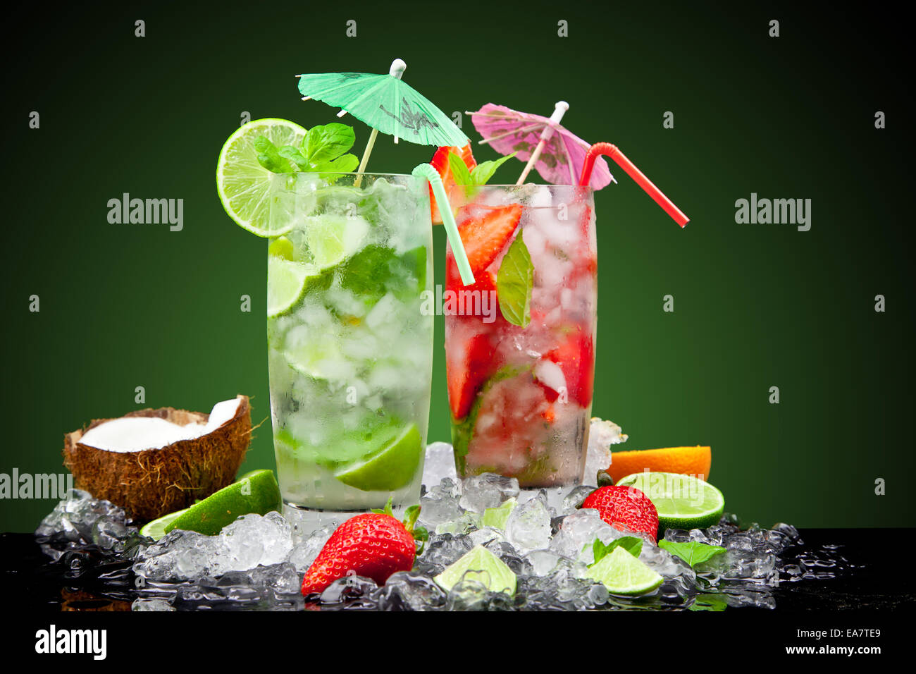 Fruit cocktail with dark background Stock Photo - Alamy