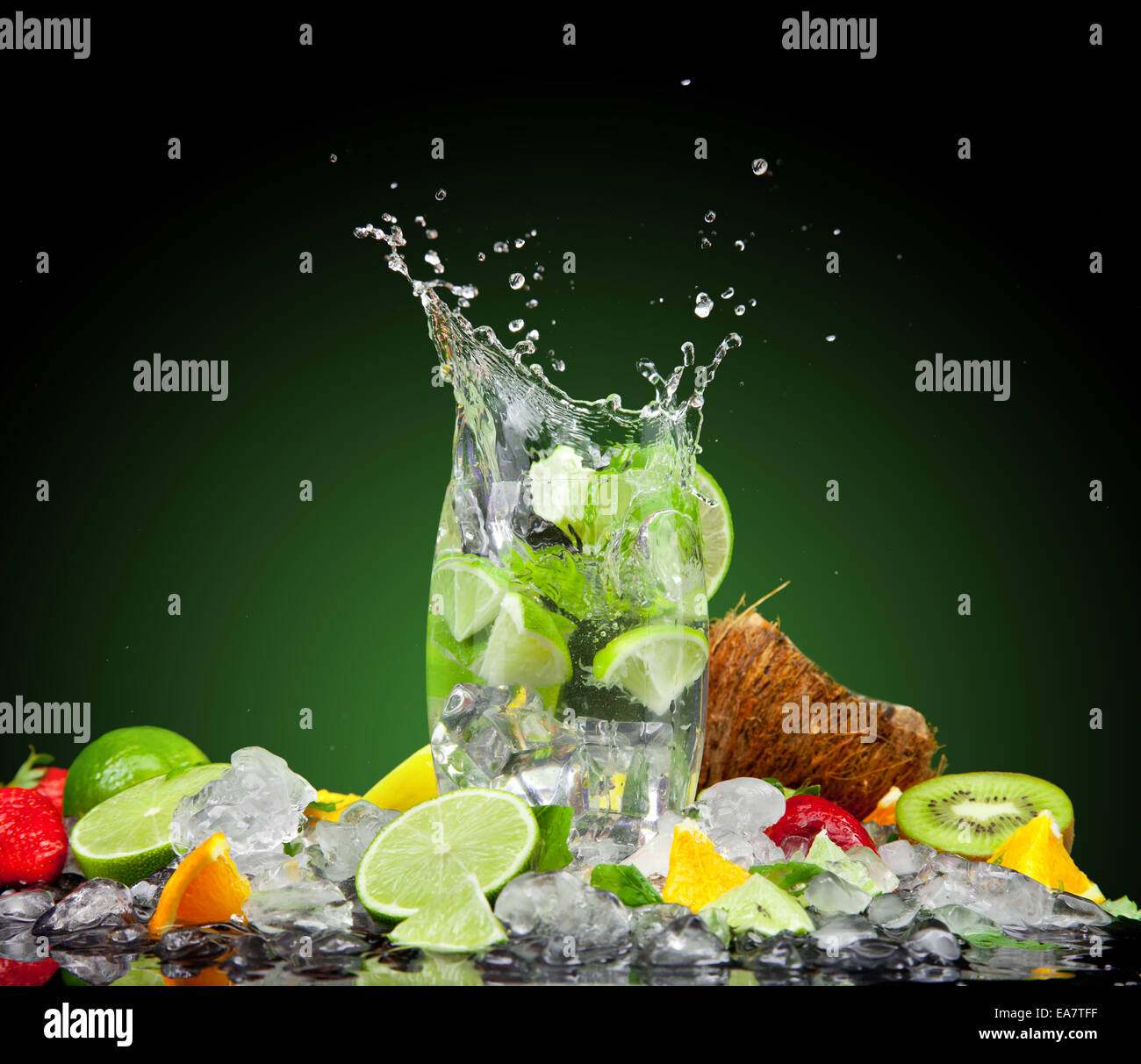 Fruit cocktail with dark background Stock Photo - Alamy