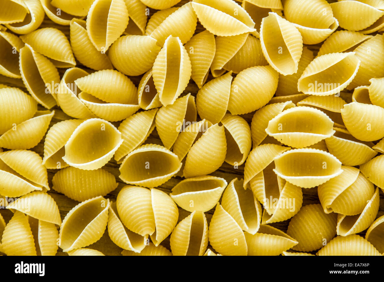 Italian dry pasta covers all over the wooden table Stock Photo - Alamy