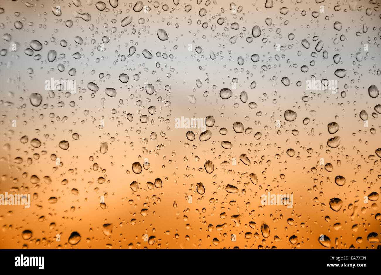 Water drop orange hi-res stock photography and images - Alamy