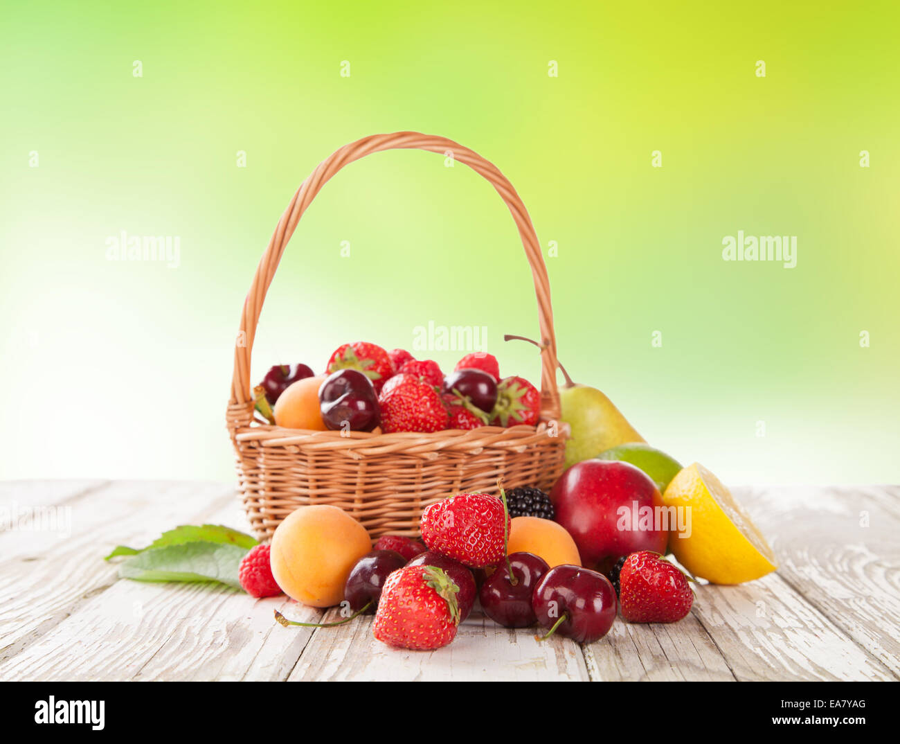 Fresh harvested fruit in basket Stock Photo - Alamy