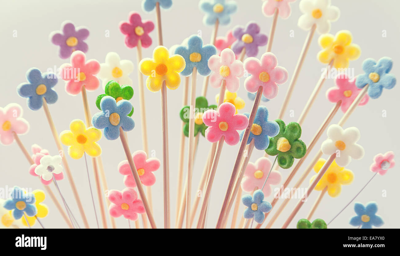 Flowers made of sugar as decoration for birthday cake Stock Photo - Alamy