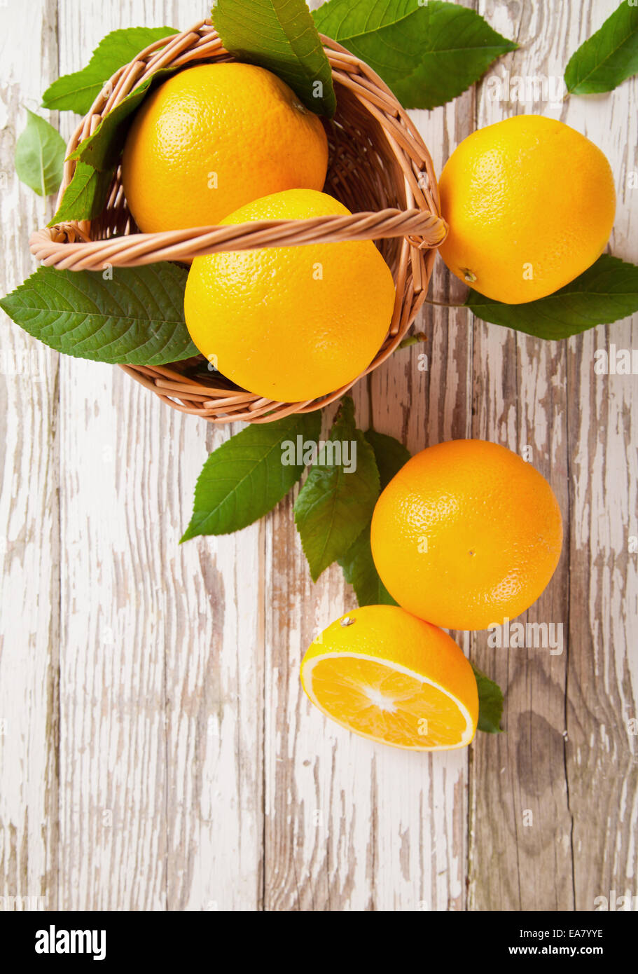 Fresh harvested oranges in basket Stock Photo - Alamy