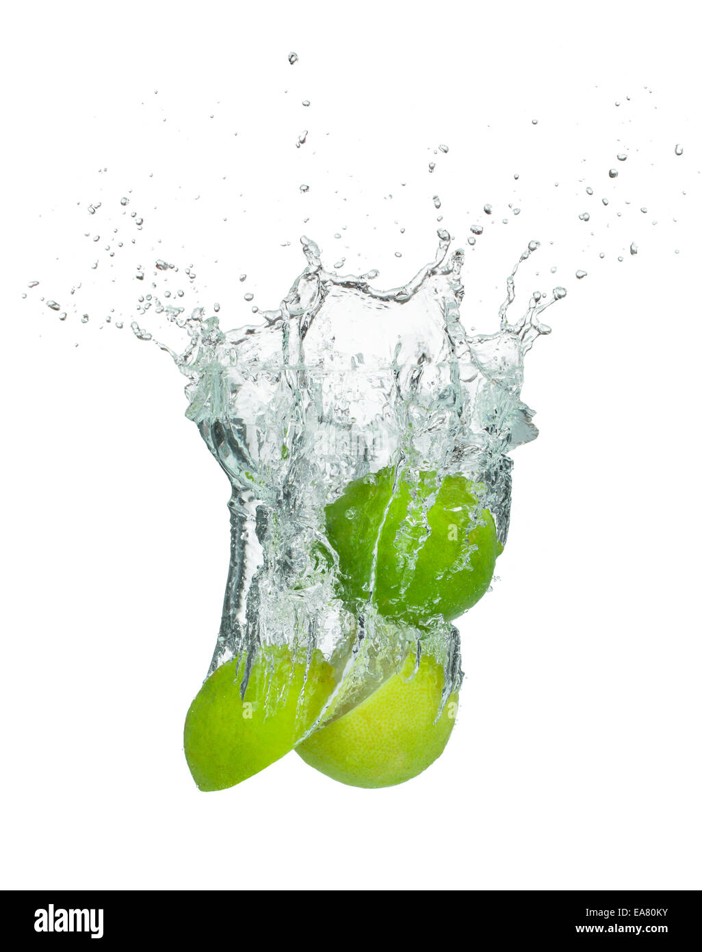 Fresh lime falling into water, isolated on white background Stock Photo ...