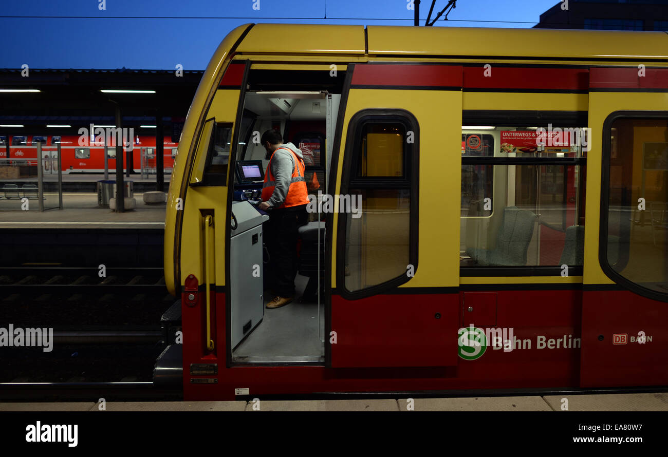 Potsdam, Germany. 08th Nov, 2014. A train driver prepares a train for ...