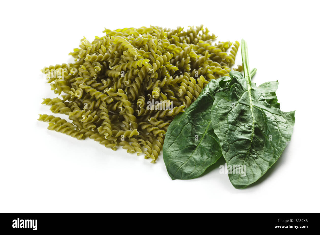 Bunch of naturally colored green pasta with spinach Stock Photo - Alamy