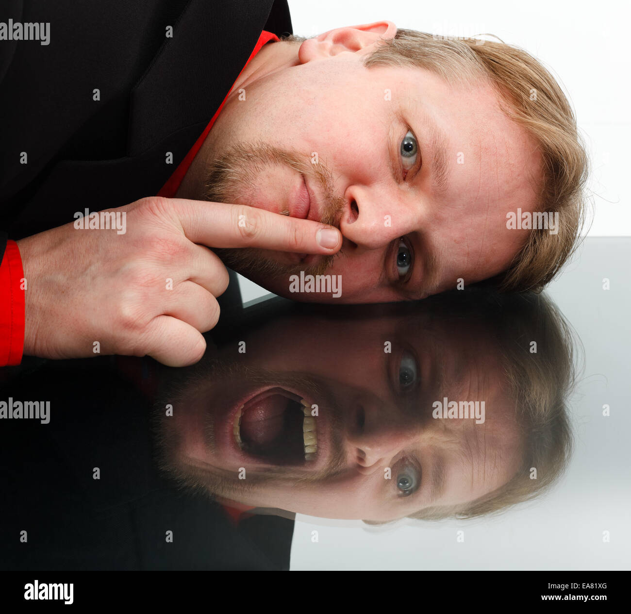 Man showing silence shouting loud hi-res stock photography and images ...