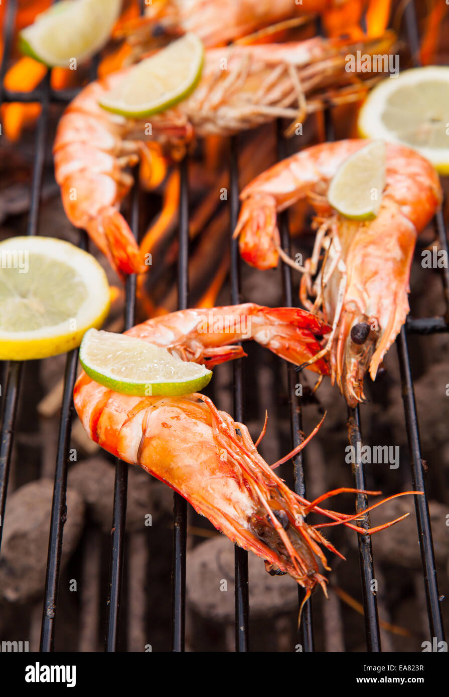 Fresh grilled prawns on fire Stock Photo - Alamy