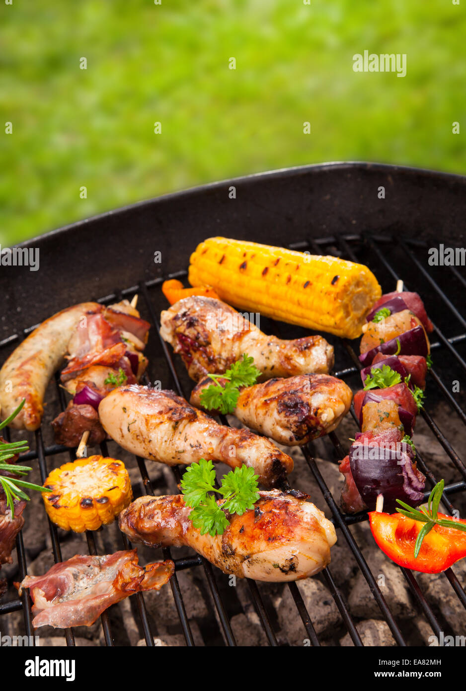Delicious fresh meat on grill Stock Photo - Alamy