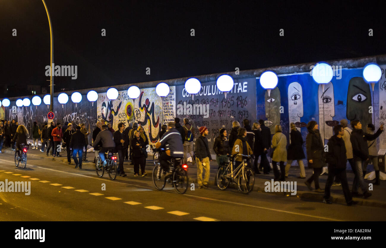 Berlin, Germany. 08th Nov, 2014. Visitors walk among balloon stands at ...
