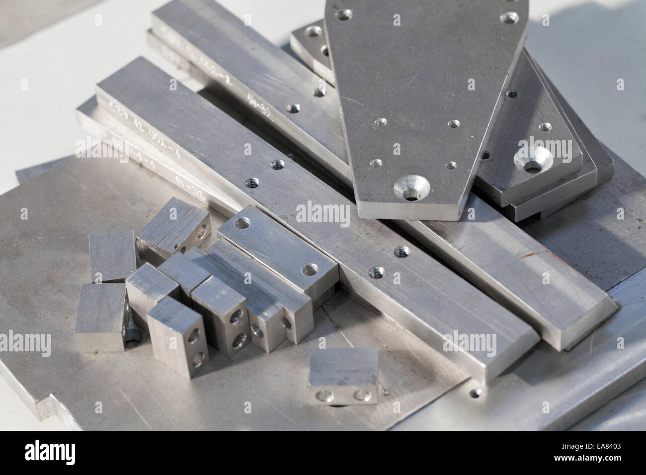 steel parts on stack background Stock Photo - Alamy