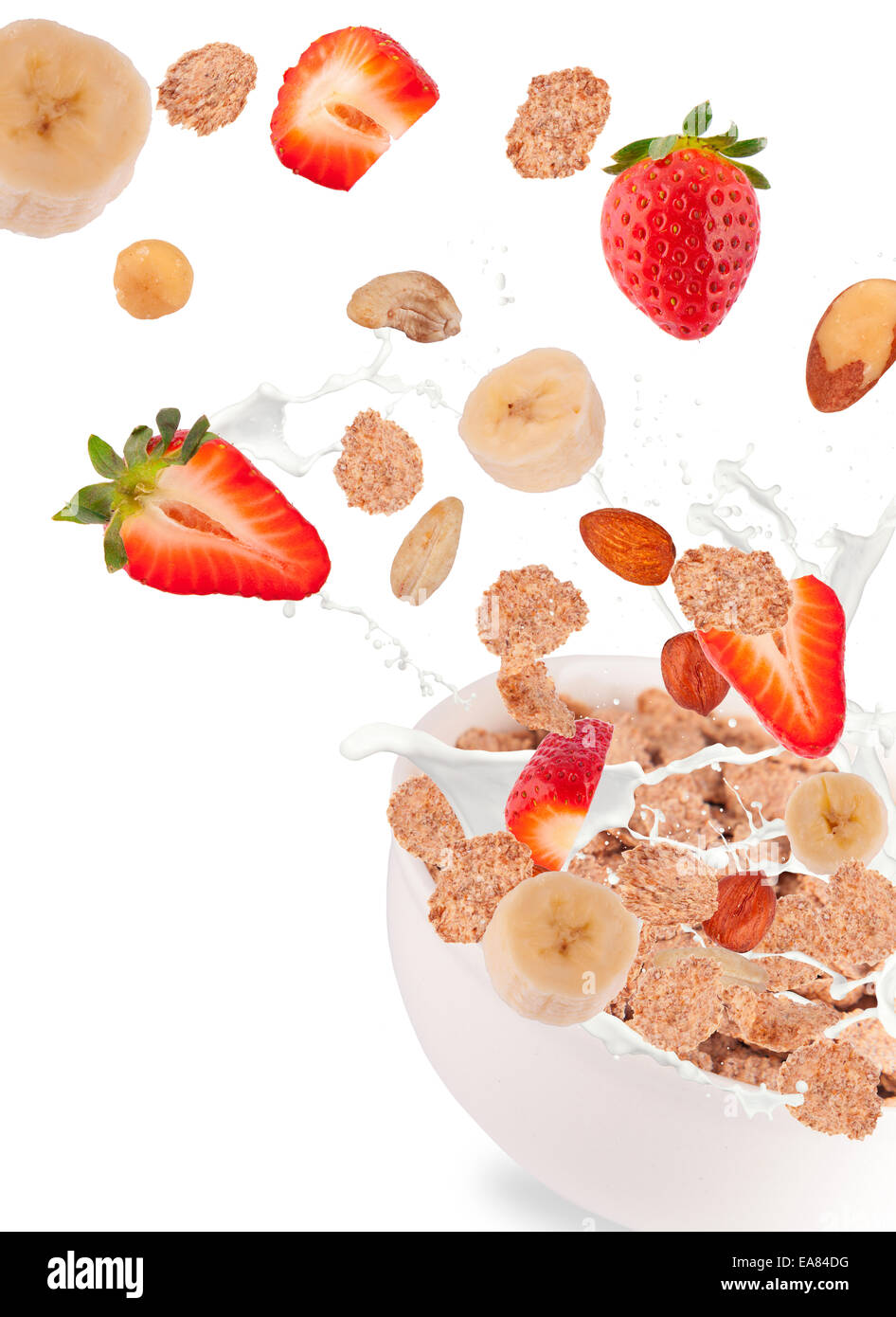 Healthy bowl with flying cereals and fruit, isolated on white ...