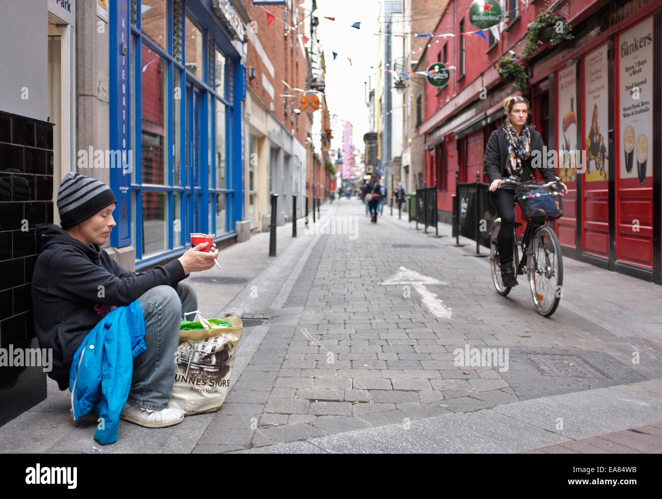 Homeless Man Central Dublin Ireland Sits On The Street Waiting For