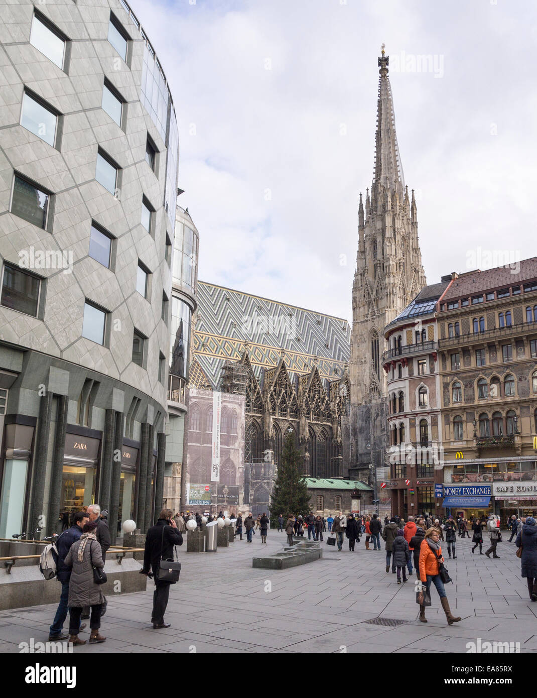 Stephansplatz and the cathedral south tower. The busy square in front ...