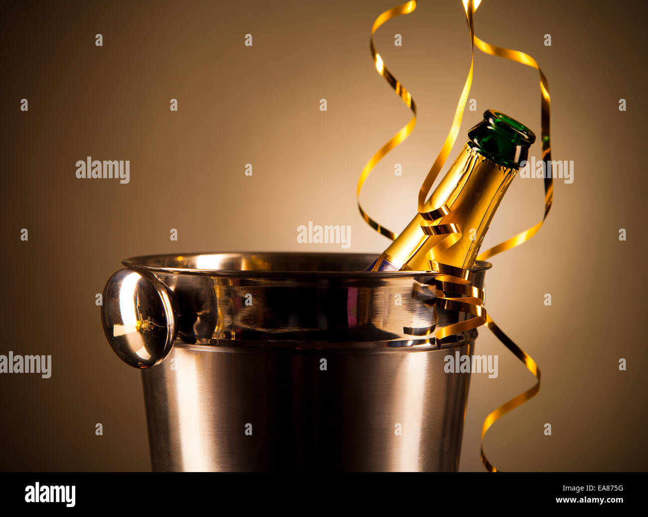 Bottle of champagne in silver bucket Stock Photo - Alamy