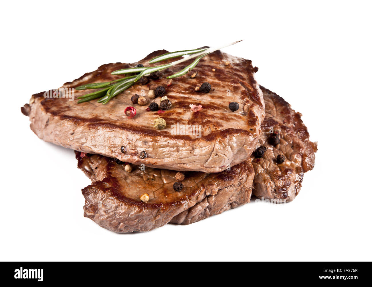 Delicious beef steaks isolated on white background Stock Photo - Alamy