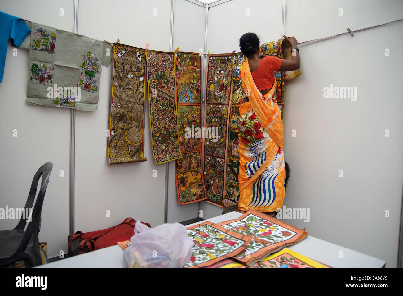 Kolkata, India. 8th Nov, 2014. A Patachira Artist is displaying her ...