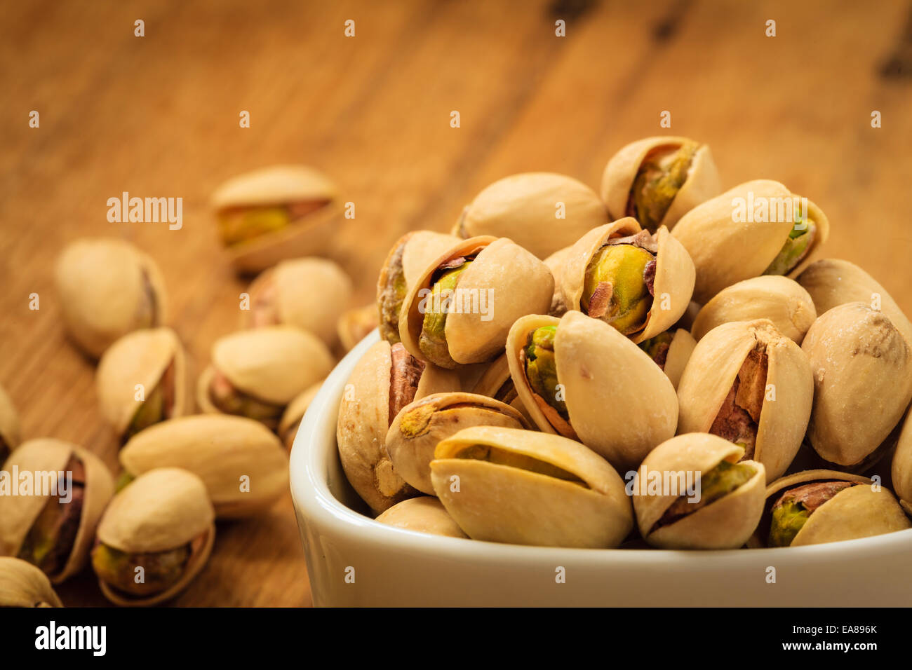 Diet healthcare concept. Roasted pistachio nuts seed with shell close ...
