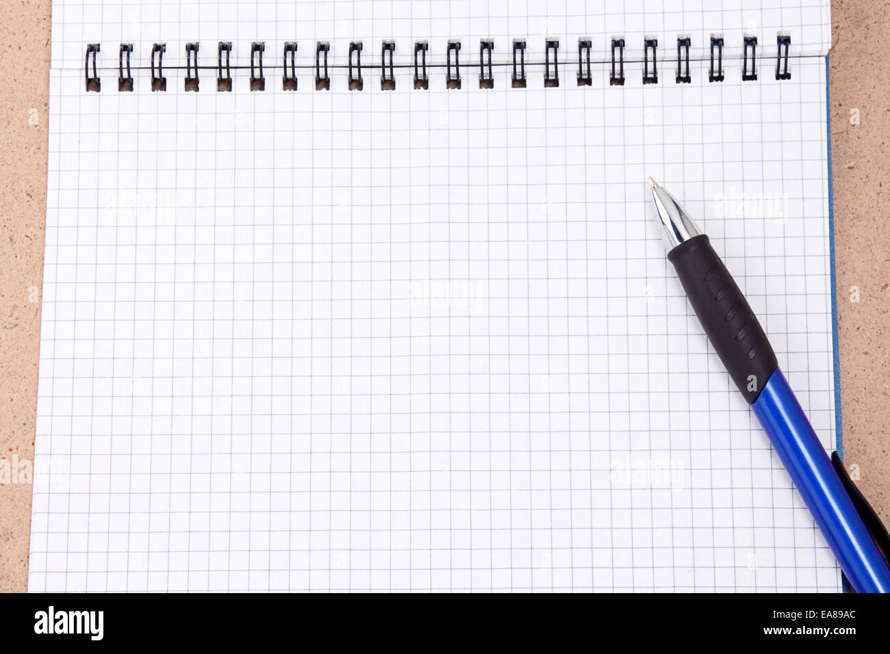 blue and black pen on binder pad Stock Photo - Alamy