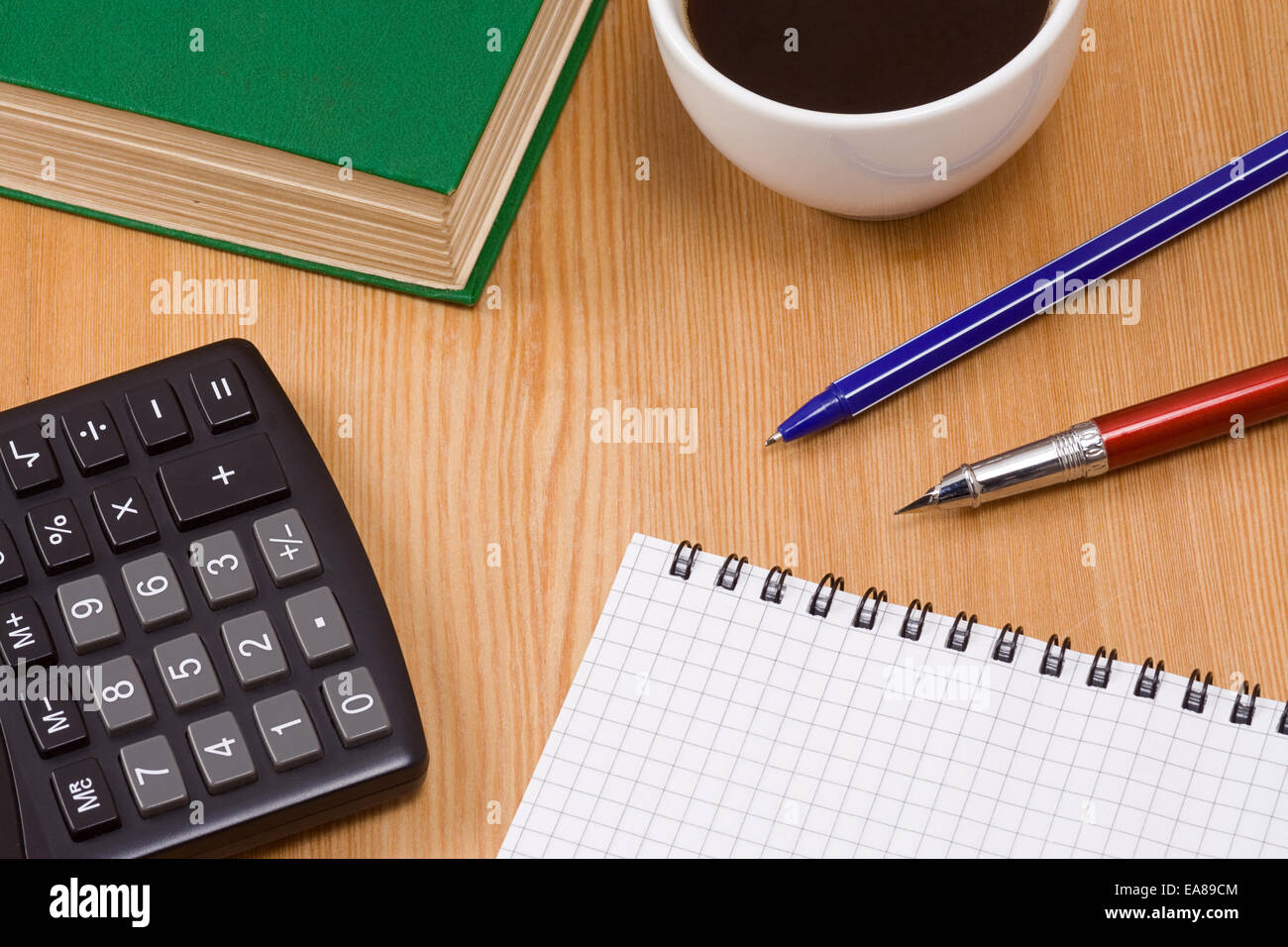set of office accessories on table Stock Photo - Alamy