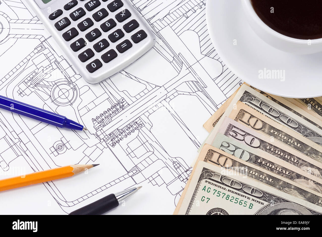 cup of coffee, dollars and pens on drafting Stock Photo - Alamy