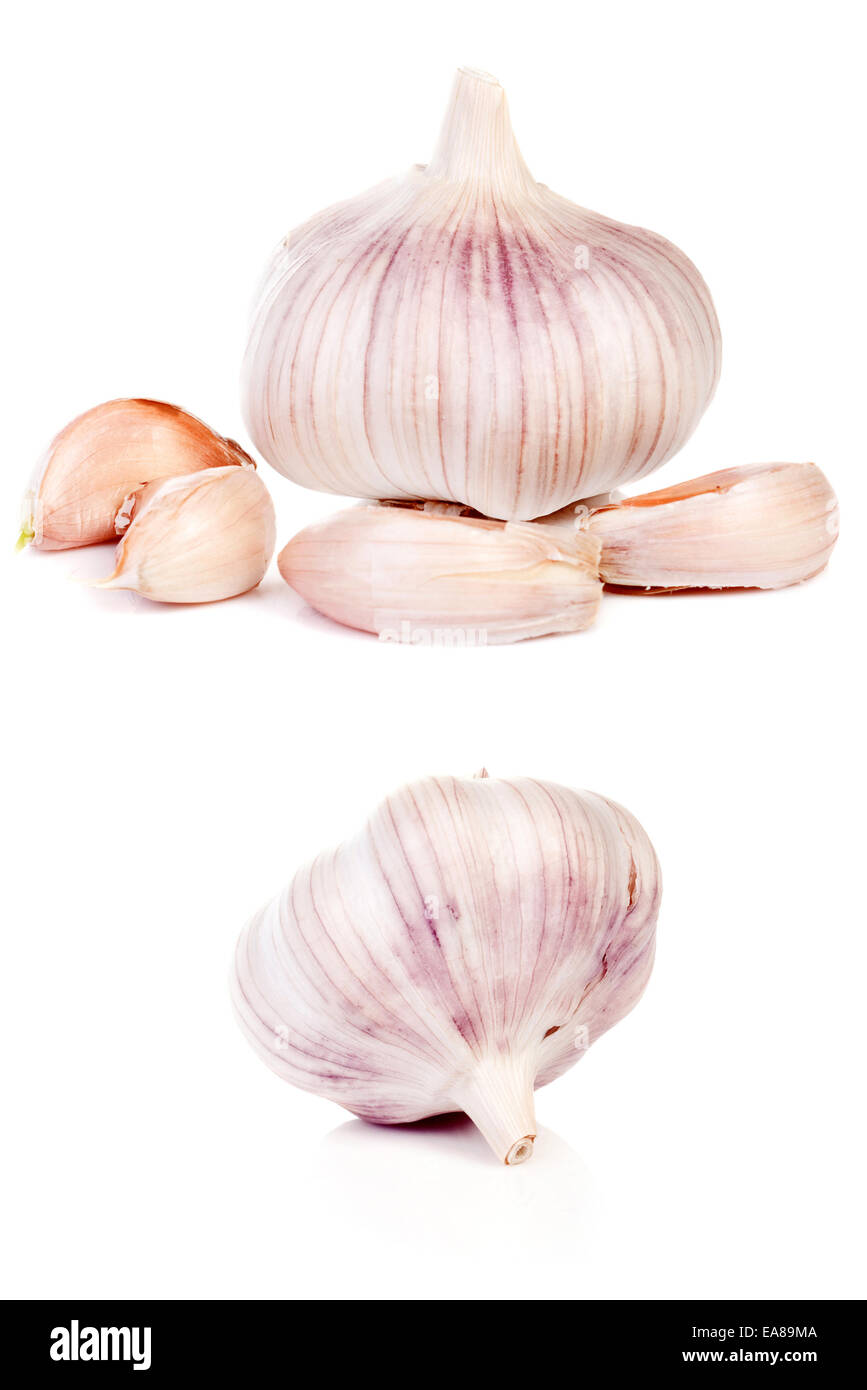 vertical image of isolated garlics Stock Photo - Alamy