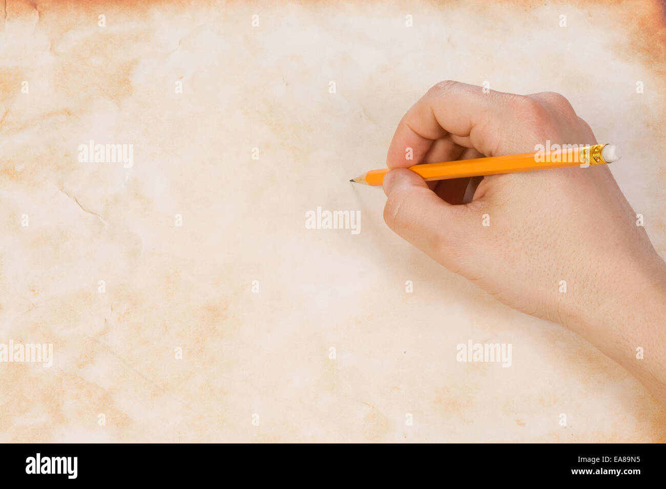 writing male hand at paper Stock Photo - Alamy