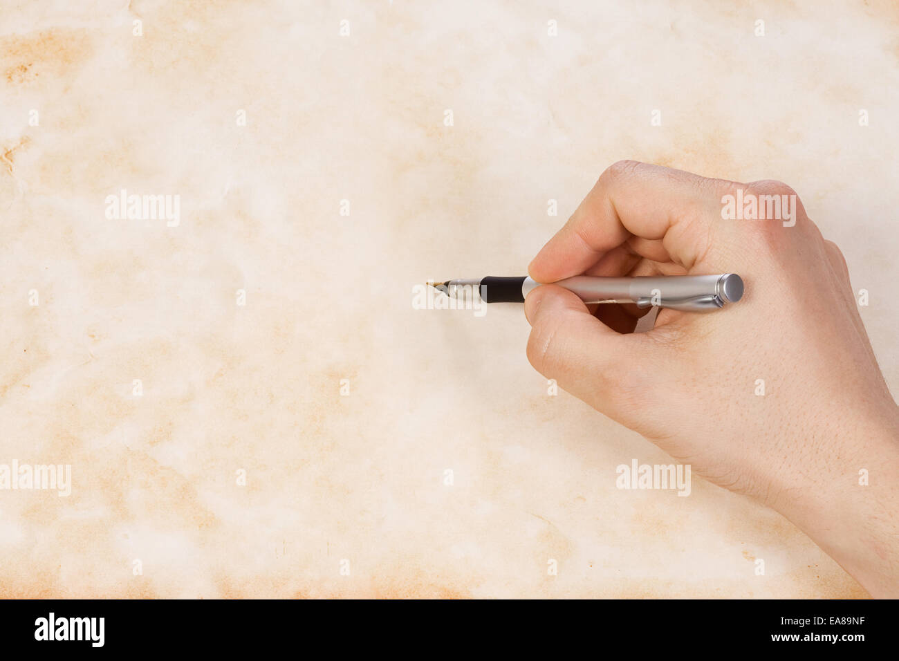 writing male hand pen on paper Stock Photo - Alamy