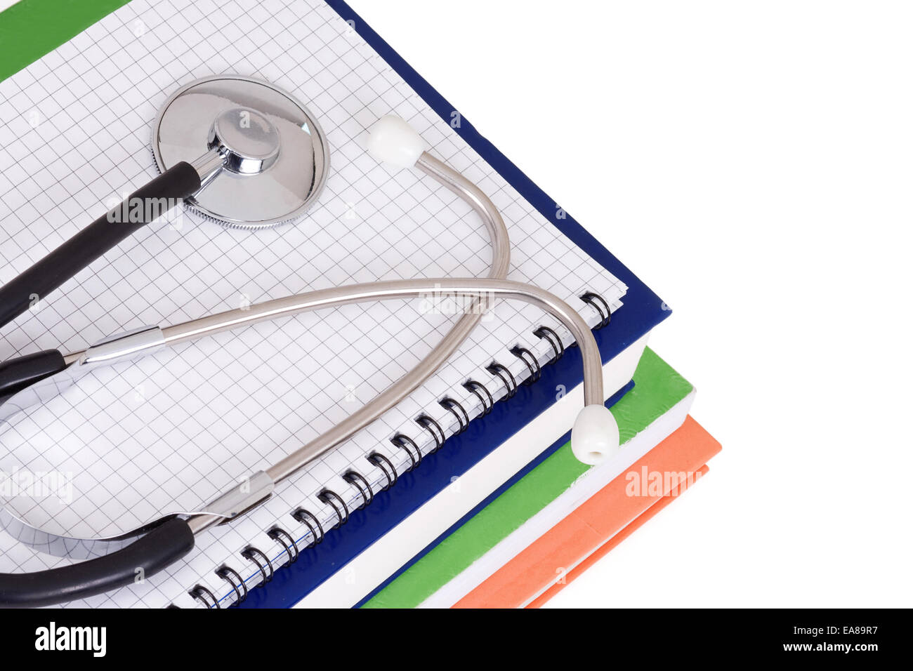 stethoscope on pad and books Stock Photo - Alamy