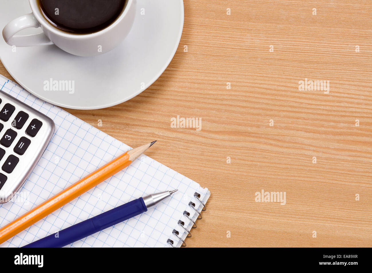 notepad and coffee at table Stock Photo - Alamy
