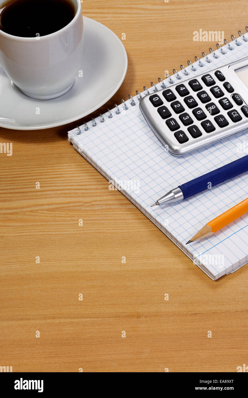 notepad and coffee at table Stock Photo - Alamy