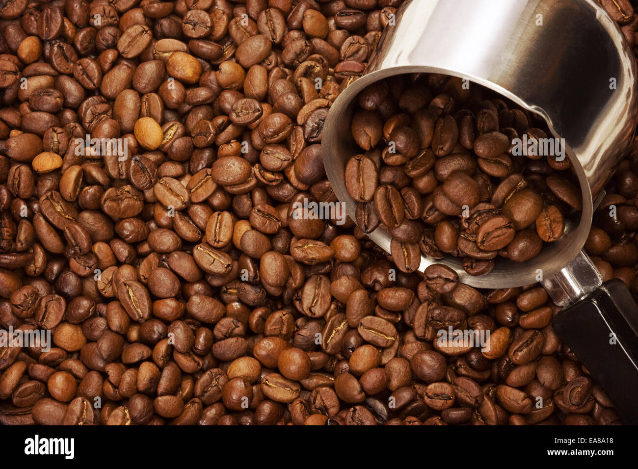 silver pot and coffee beans Stock Photo - Alamy
