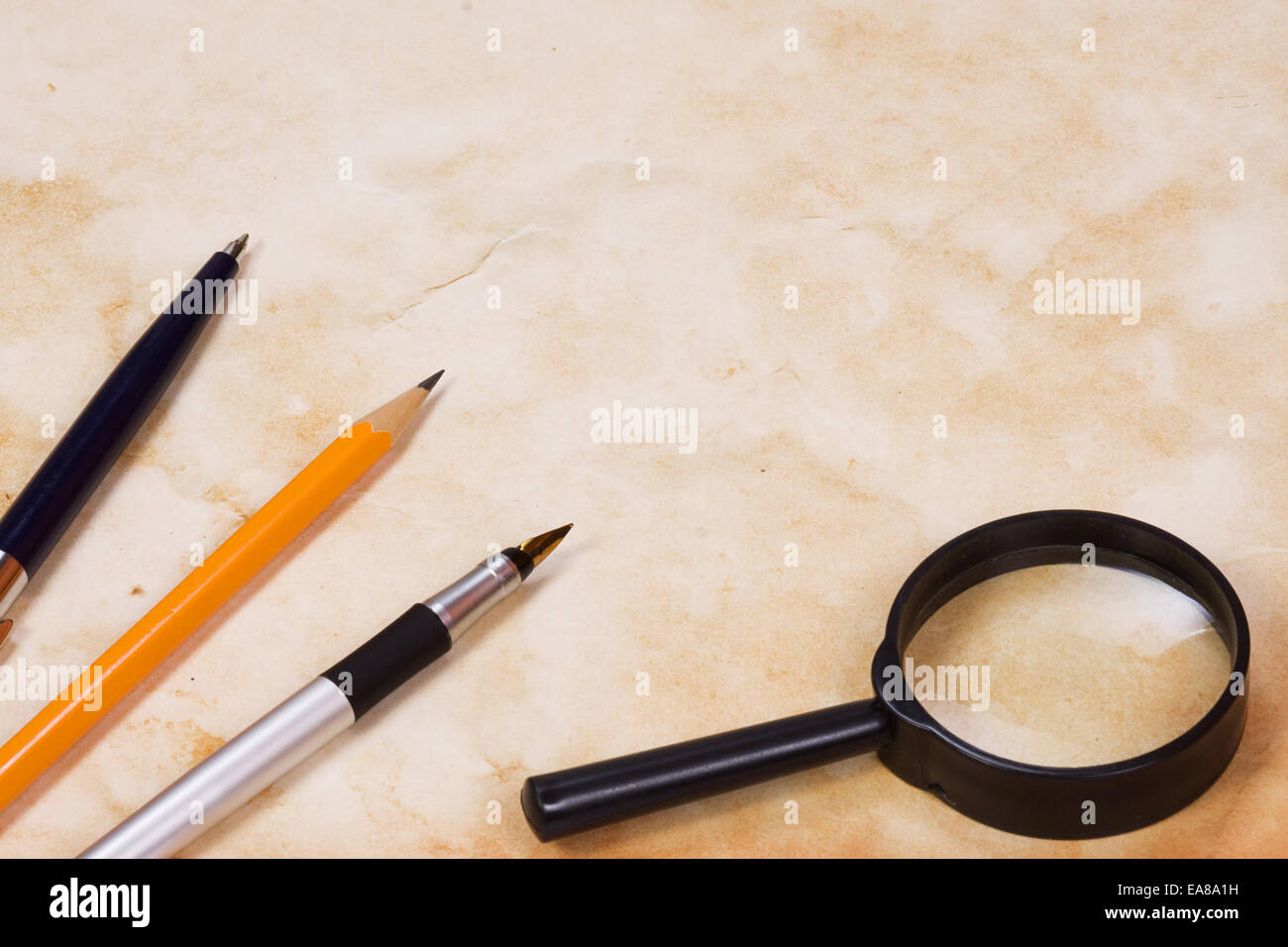 image of pen and pencil at paper Stock Photo - Alamy