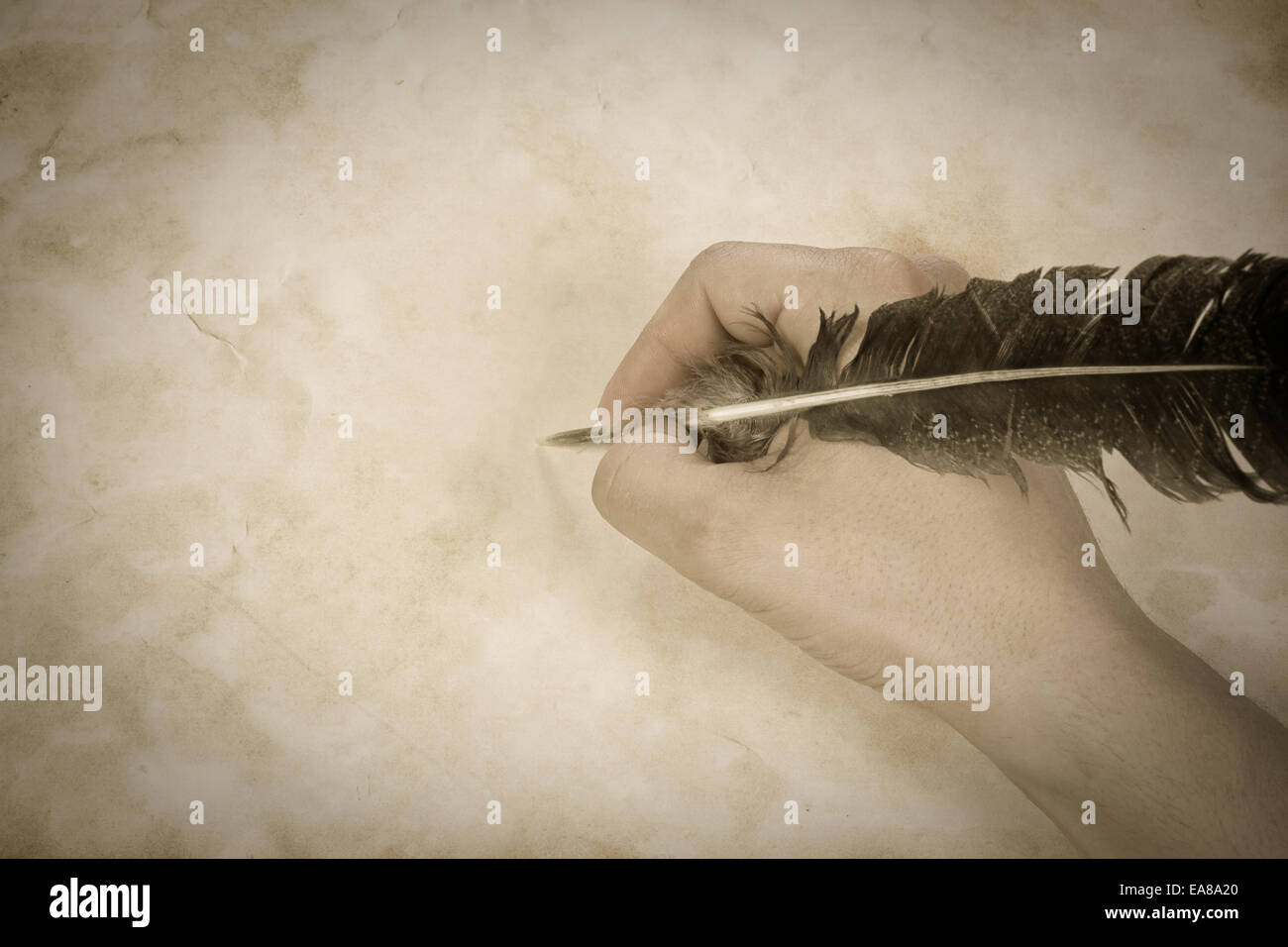 vintage image writing hand with feather Stock Photo - Alamy