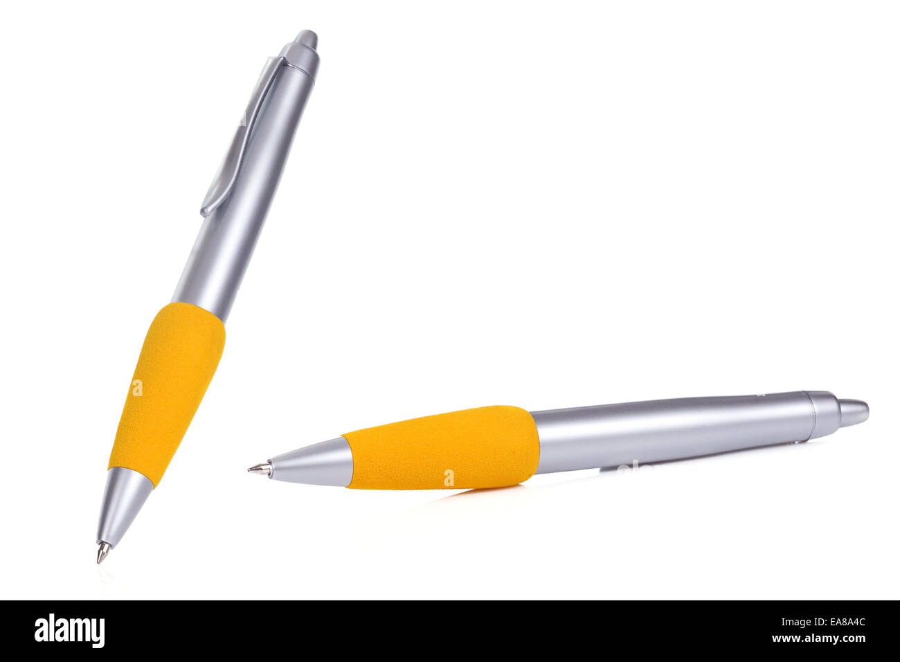 two silver and yellow pens Stock Photo - Alamy