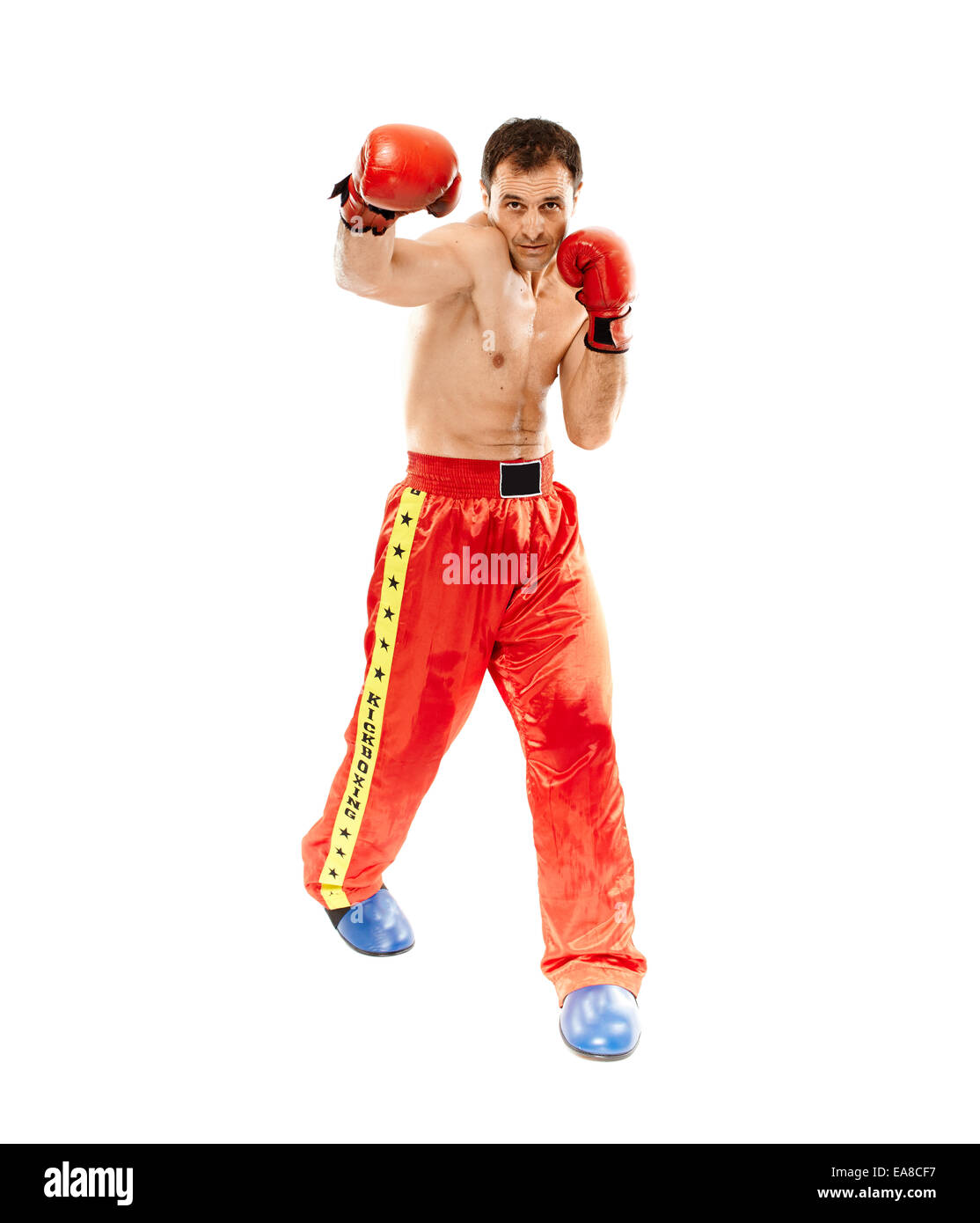 Caucasian kickboxer or muay thai fighter executing a punch, isolated on ...