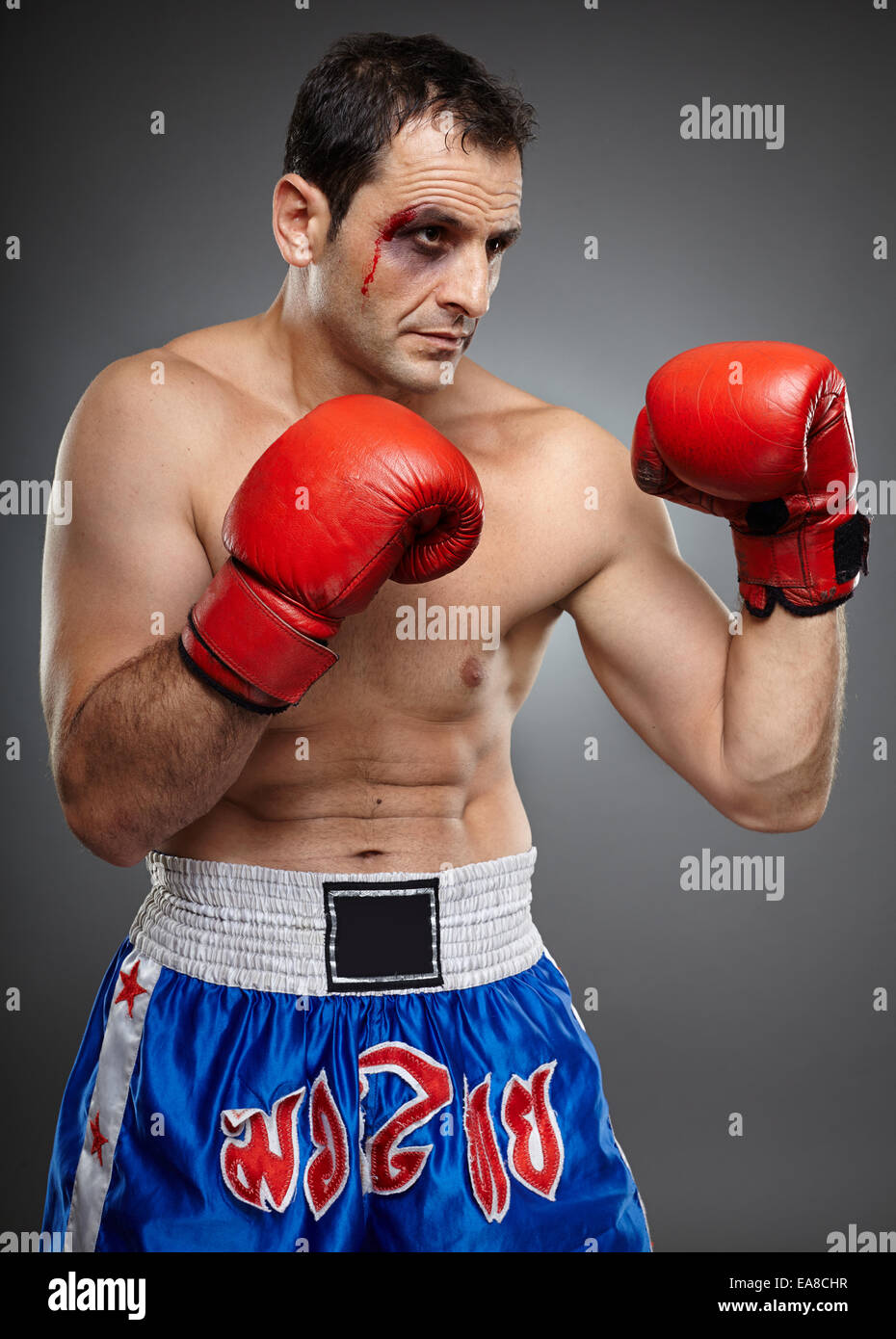 Boxing blood gloves hi-res stock photography and images - Alamy