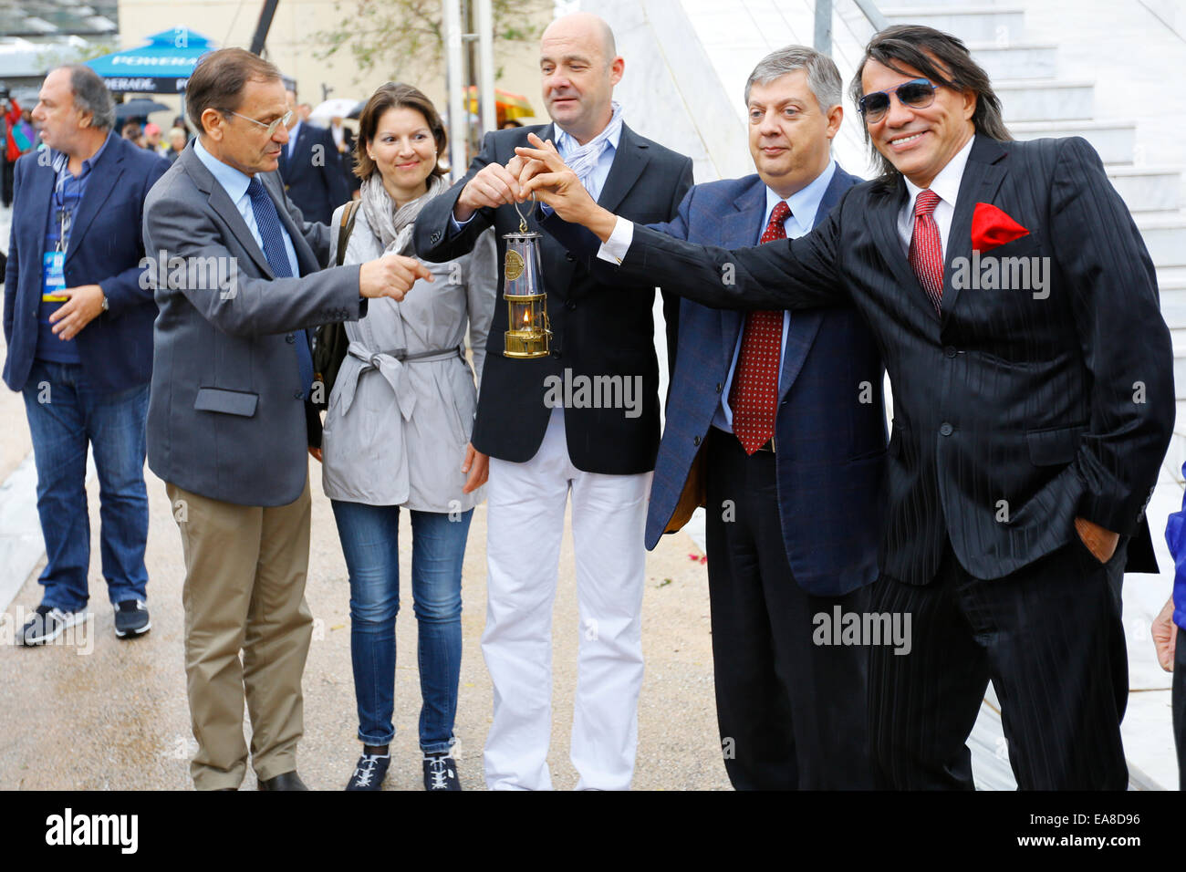 The mayor of Marathon, Ilias Psinakis (right), poses with ...