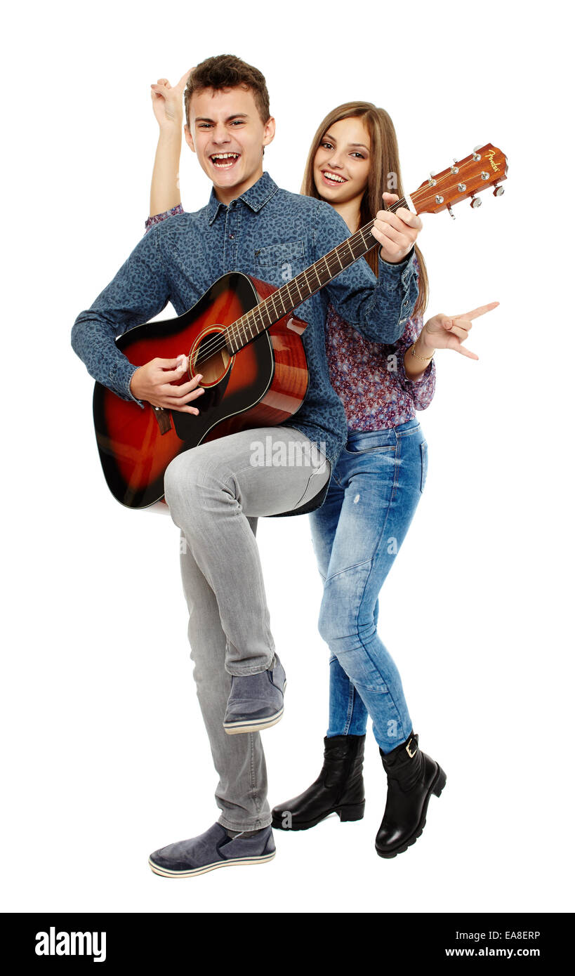 Teenagers singing and playing guitar, having fun, full body shot Stock ...