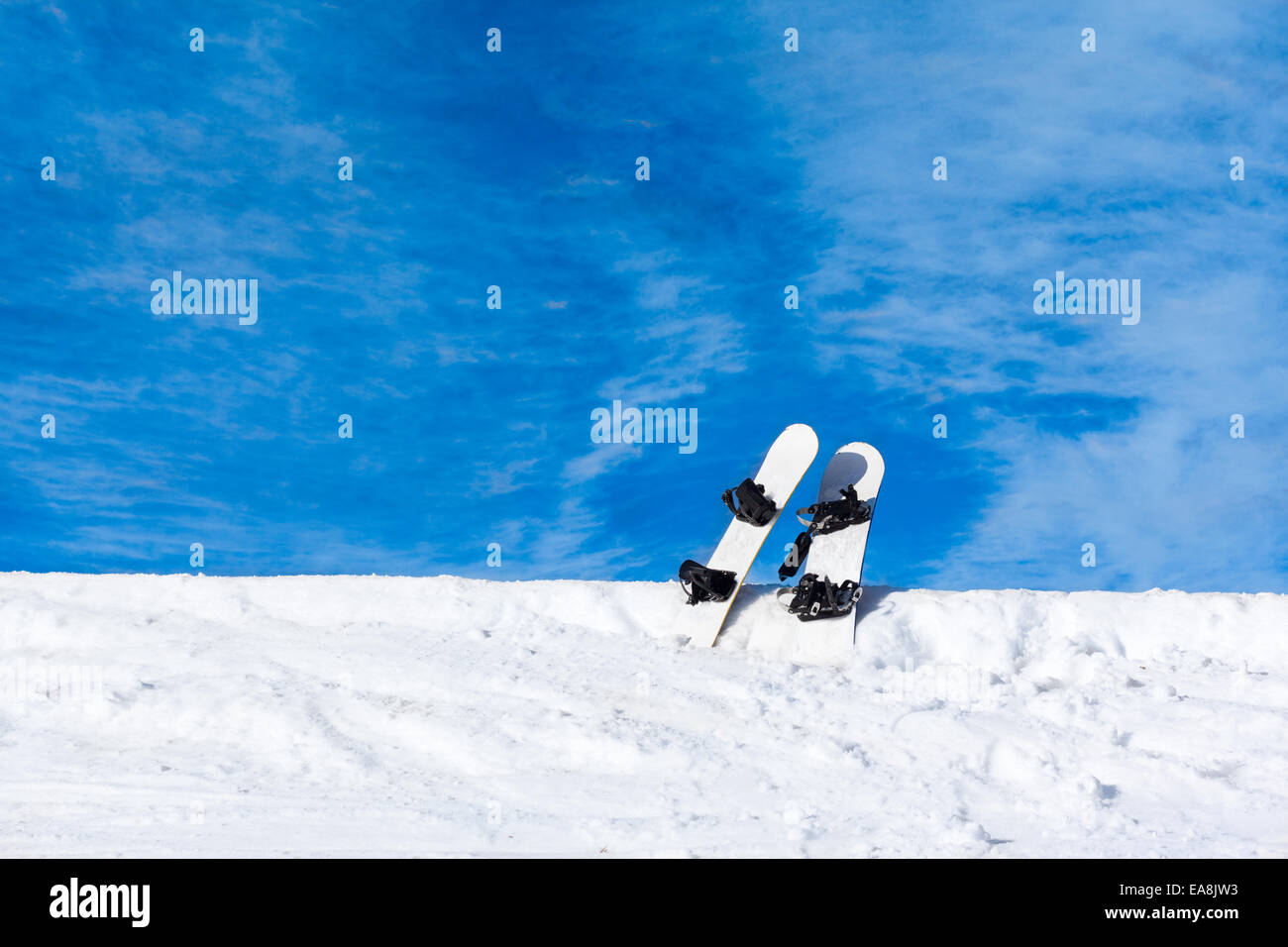 two snowboard in snow mountain slope Stock Photo - Alamy