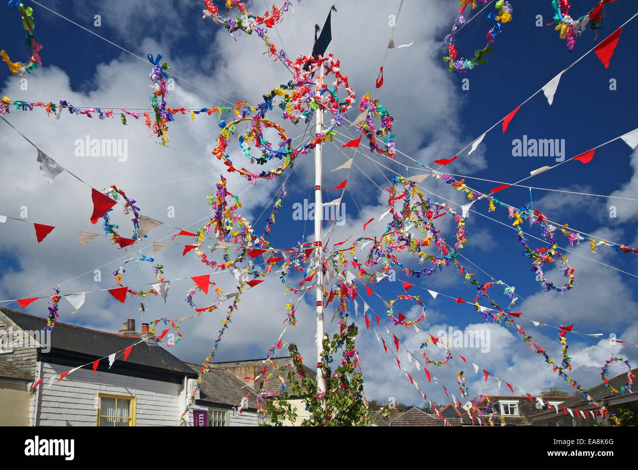 Looking up at colourful decorated Maypole in Padstow on the first of ...