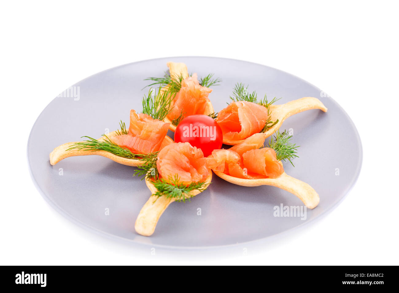 Salmon rolled fillet in pastries on plate Stock Photo - Alamy